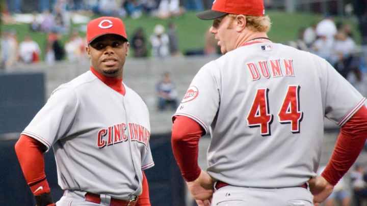 Which hitters in MLB history have at least 50 home runs in a single season?